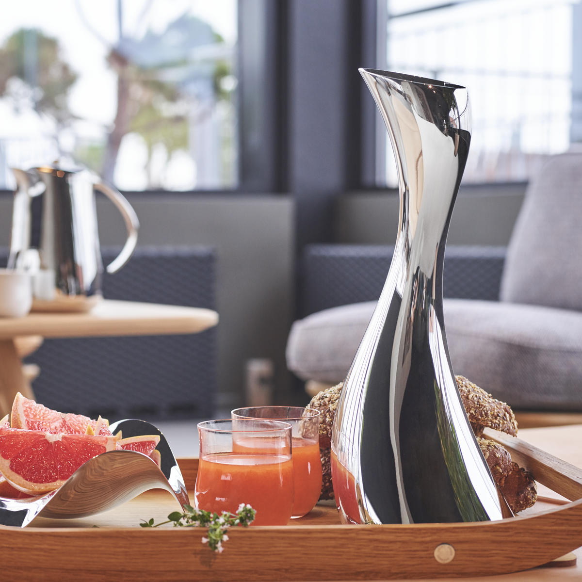 COBRA iconic curved pitcher in stainless steel | Georg Jensen